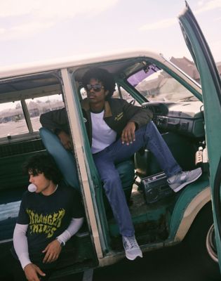 Wrangler® X Stranger Things ™ 13MWZ | Shop the Collection | Wrangler®